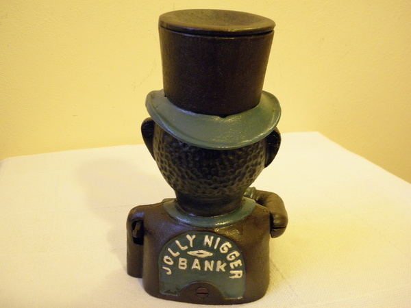 KOVOVÁ MECHANICKÁ KASIČKA - JOLLY NIGGER BANK