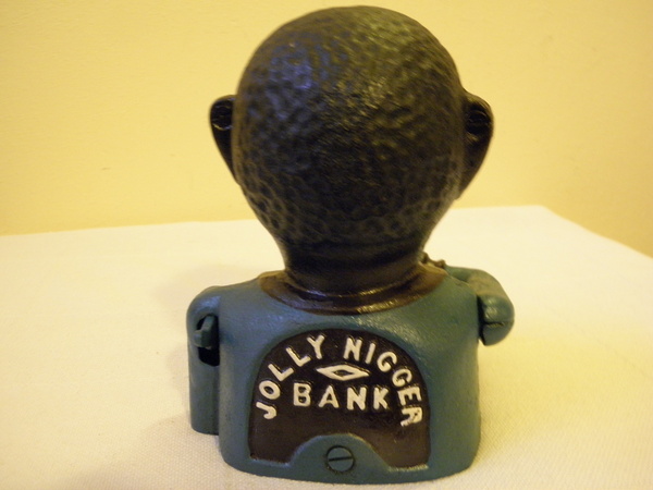 KOVOVÁ MECHANICKÁ KASIČKA - JOLLY NIGGER BANK